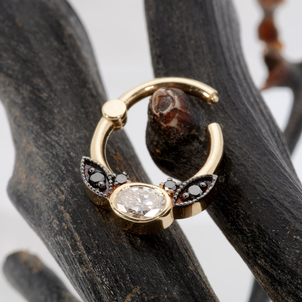 Lotus Tragus Piercing – Magic Hammer